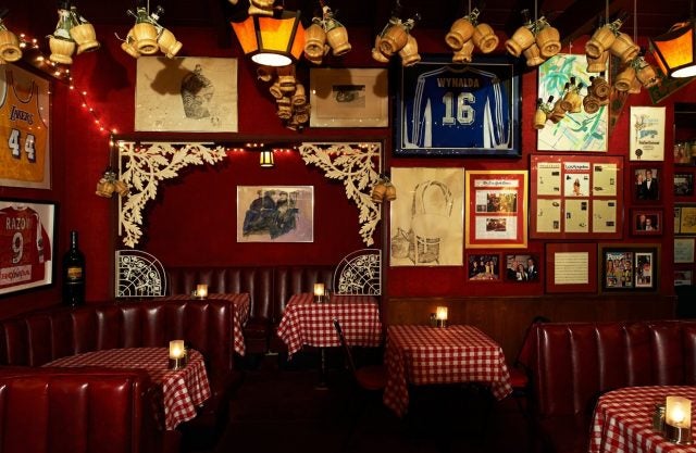 Why Are Italian Restaurants Always Covered in Celebrity Photos?